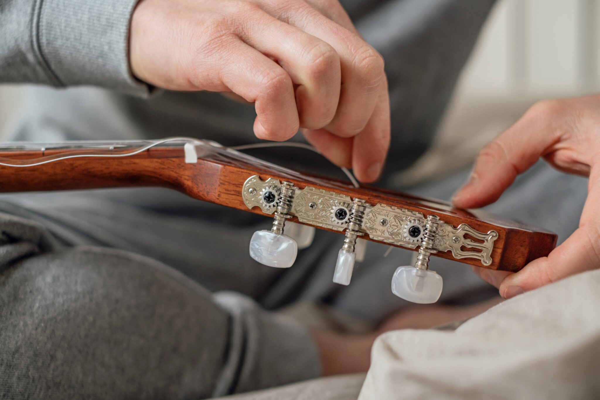 How to Tune an Acoustic Guitar by Ear