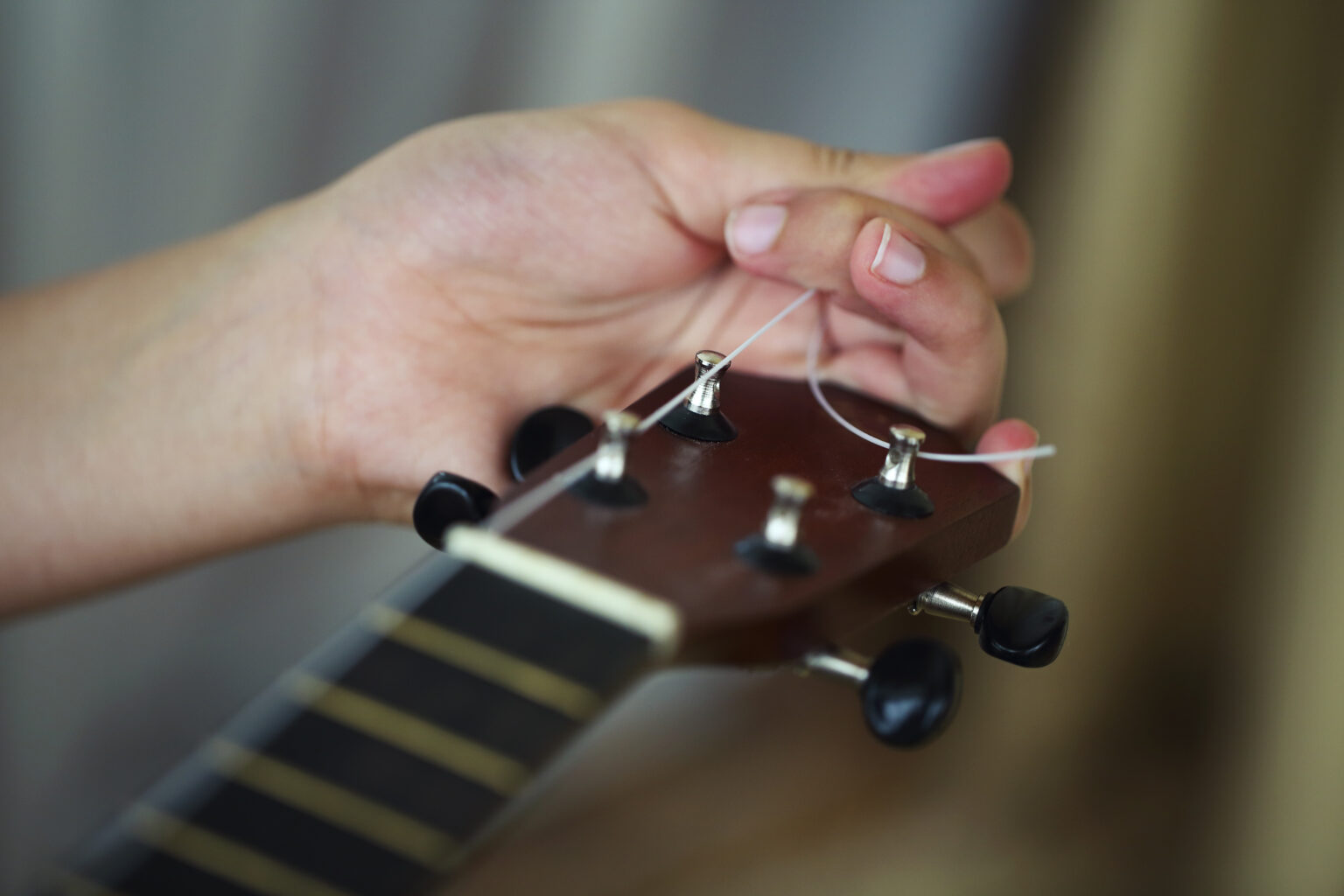 How to Tune an Acoustic Guitar by Ear